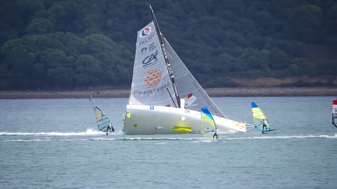 Windsurf MagazineIMOCA 60 YACHT v FOIL WINDSURFER | Windsurf Magazine